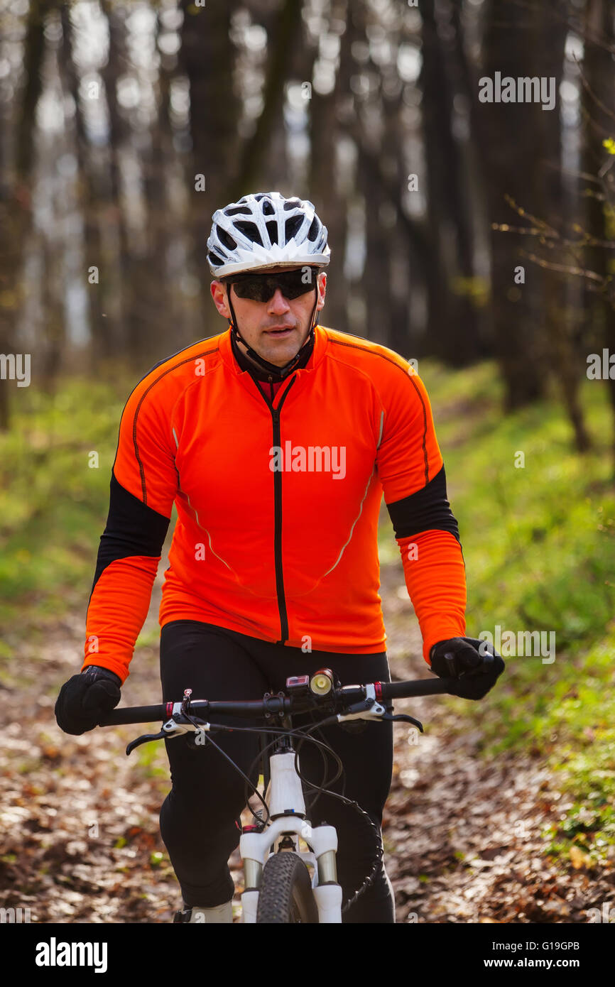 Man cyclist riding the bicycle Stock Photo - Alamy