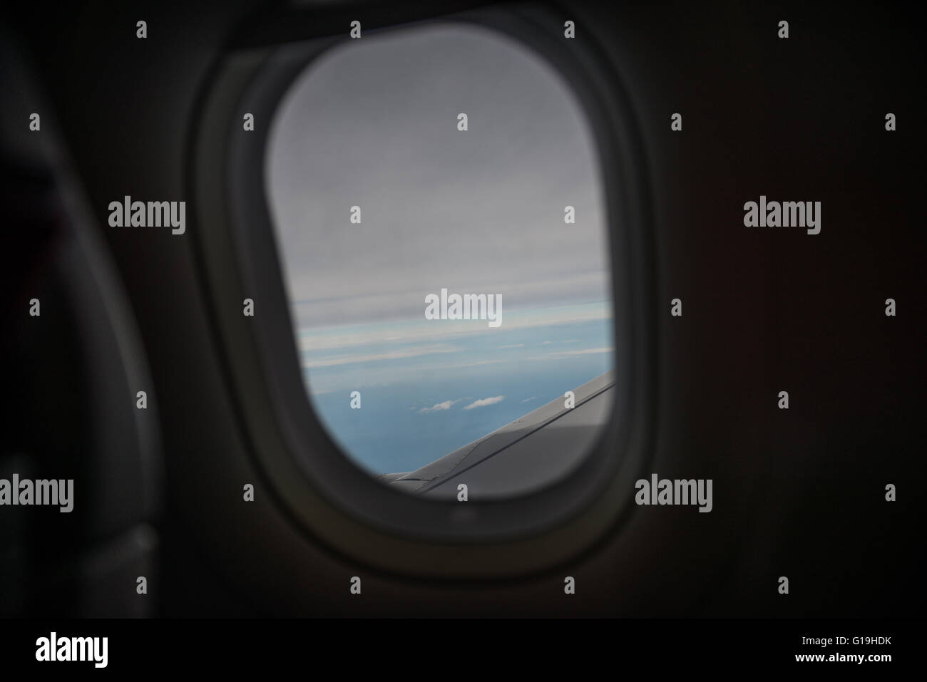 Airplane window from inside Stock Photo - Alamy