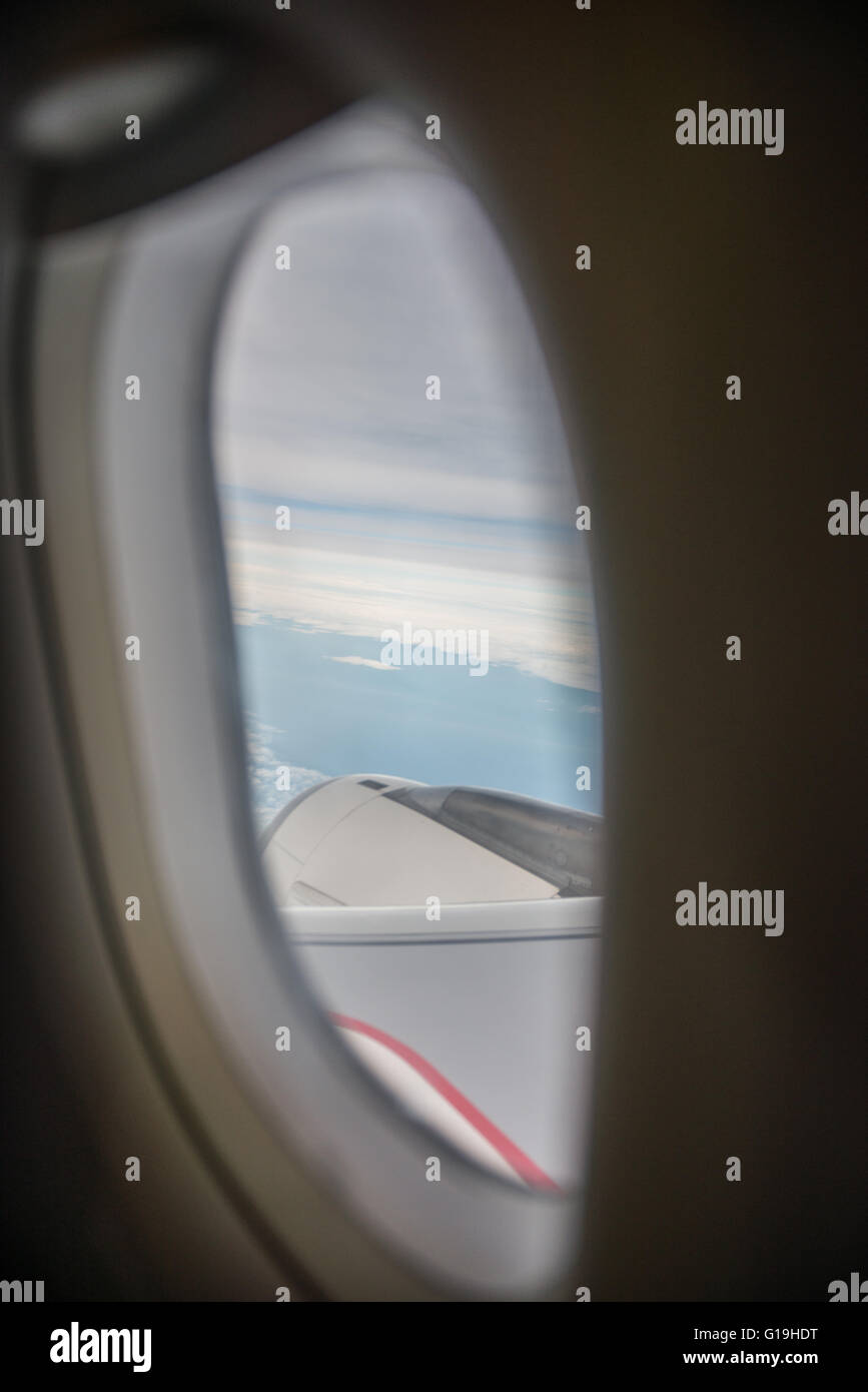 Airplane window from inside Stock Photo - Alamy