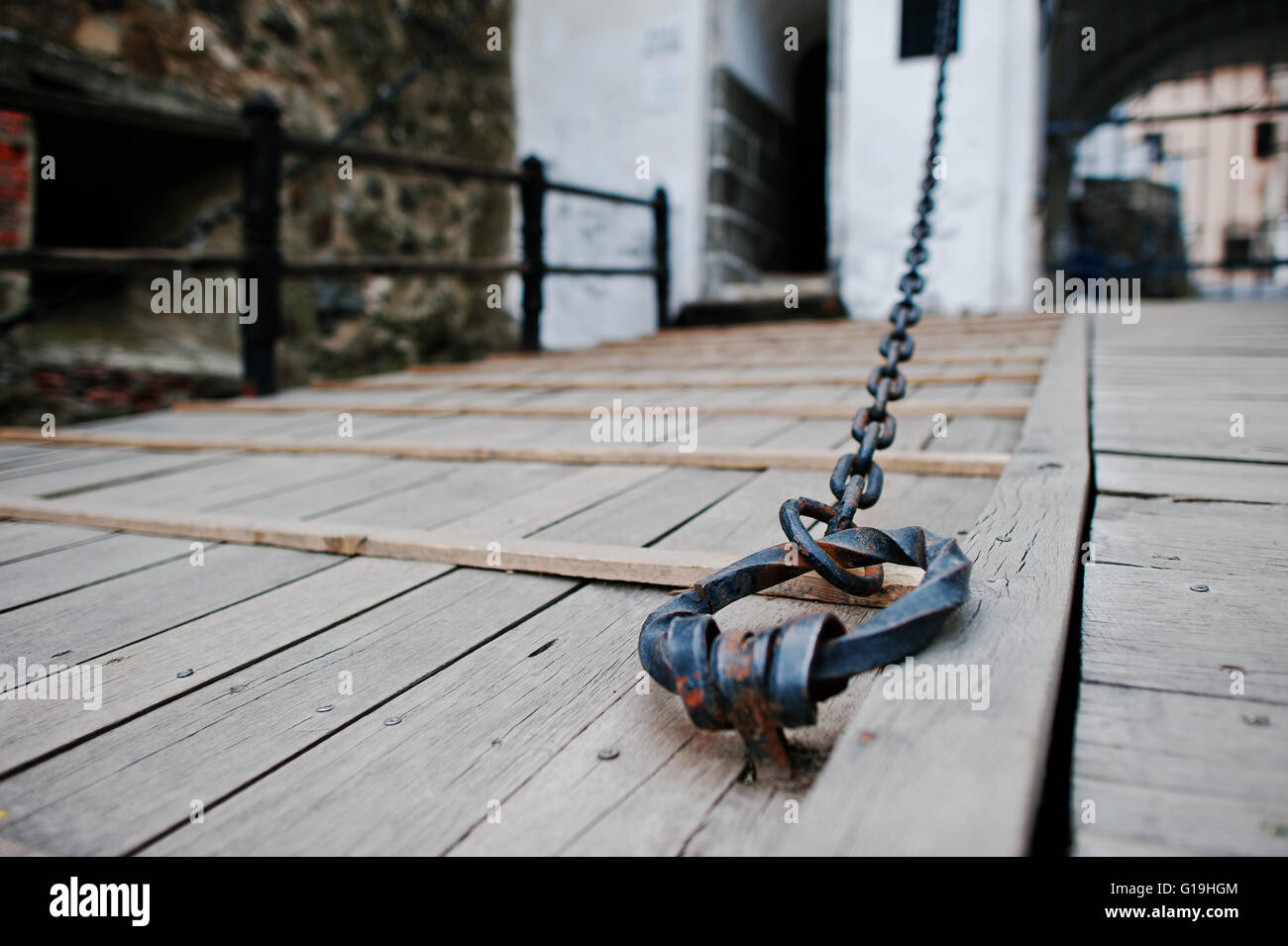 Chain gate of old castle Stock Photo - Alamy