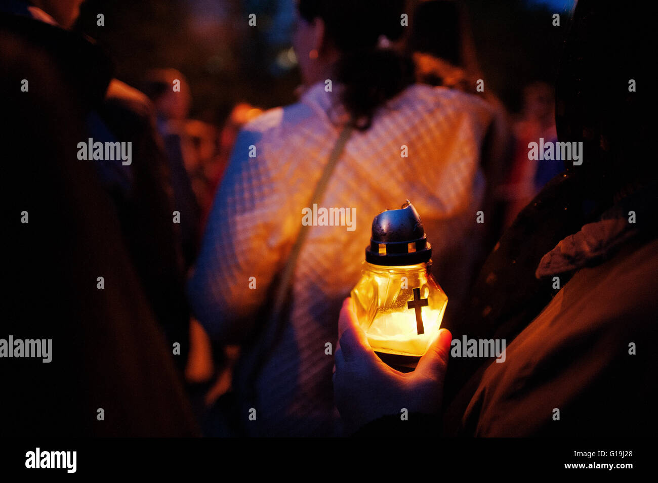 Funeral candle lamp in hand at night Stock Photo - Alamy