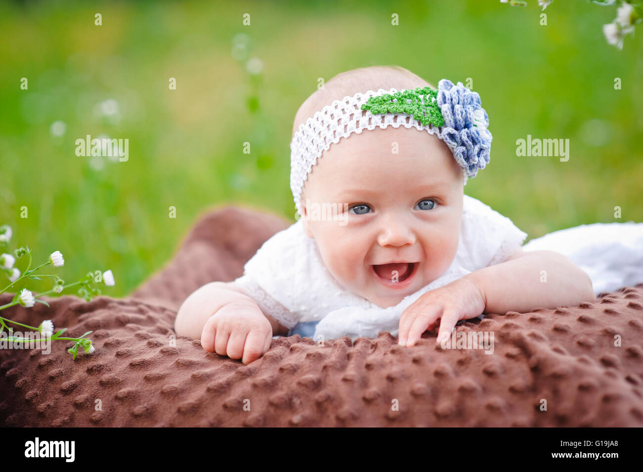 Summer portrait of beautiful baby girl Stock Photo - Alamy