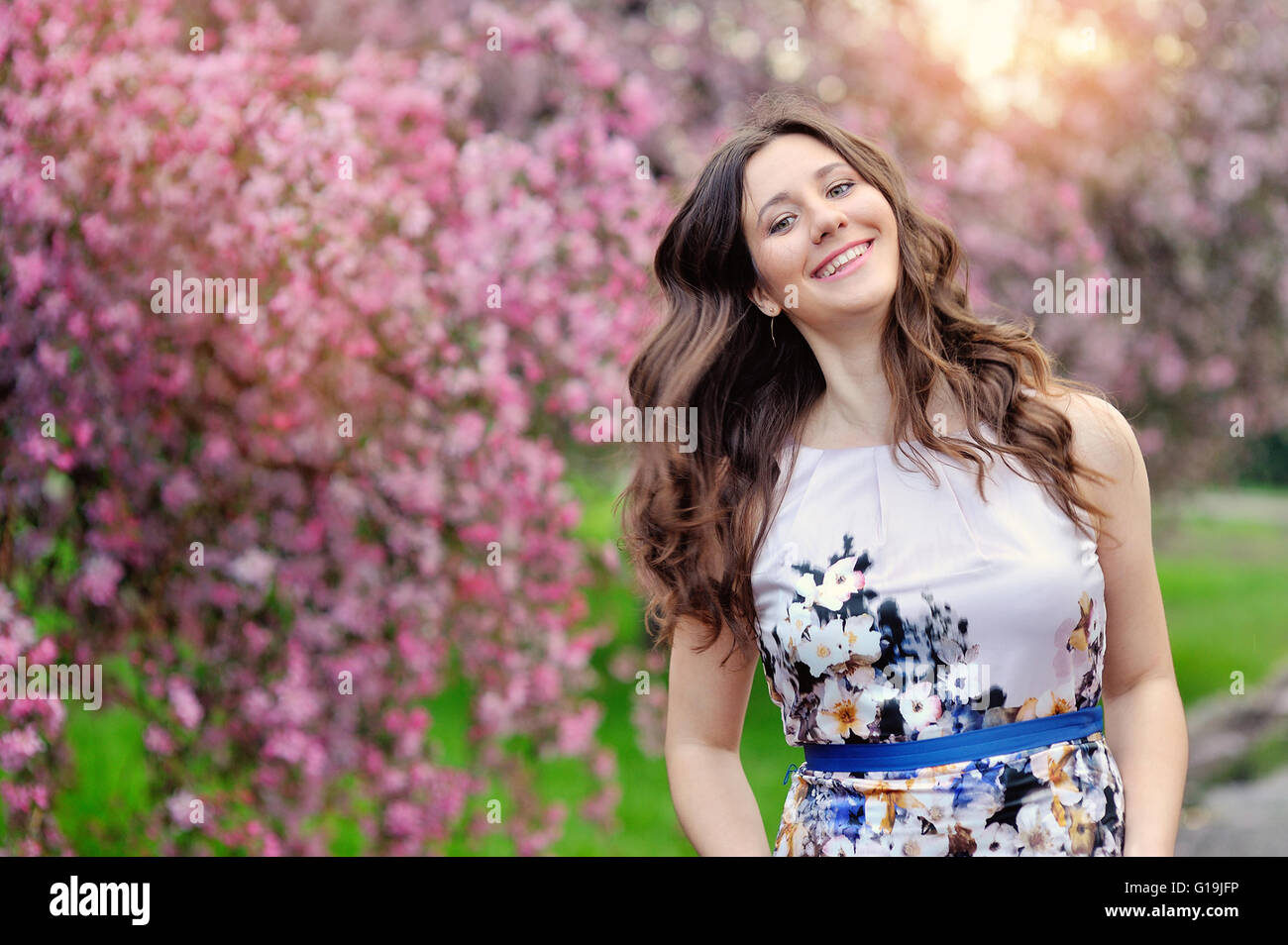 Beautiful Girl with Spring Flowers Stock Photo - Alamy