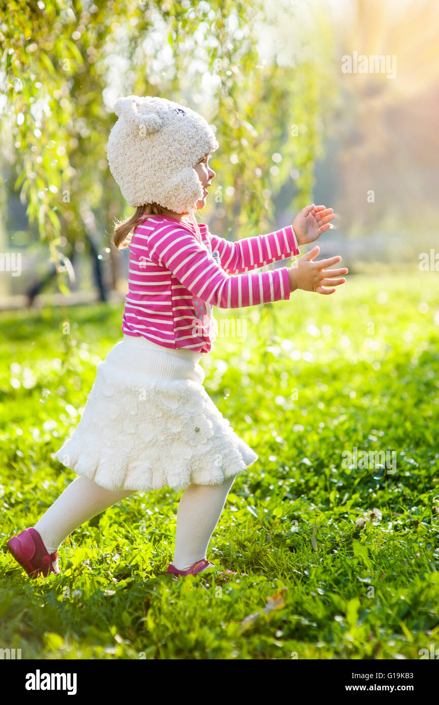 girl running in the park Stock Photo - Alamy