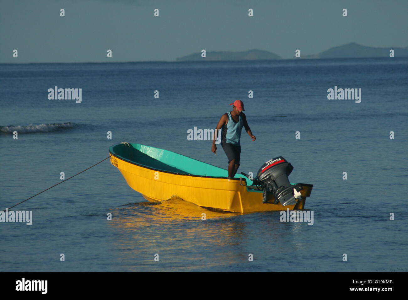 Yellow boat on sea Stock Photo - Alamy