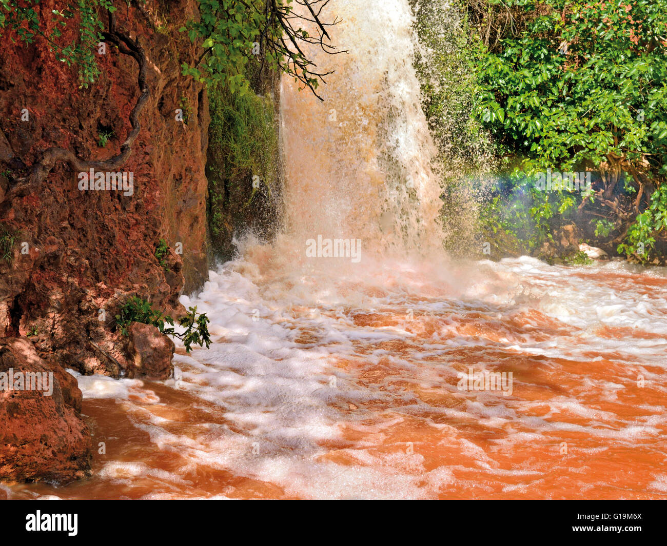 Portugal, Algarve: Waterfall Queda do Vigário after heavy rainfalls ...