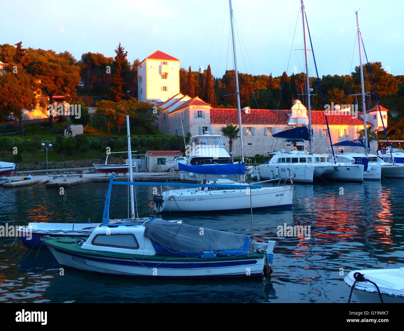 Historical buildings with docked boats Stock Photo - Alamy