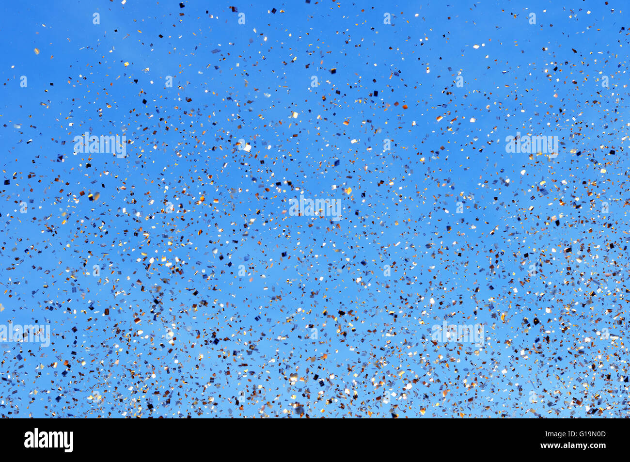 Falling golden confetti in hi-res stock photography and images - Alamy