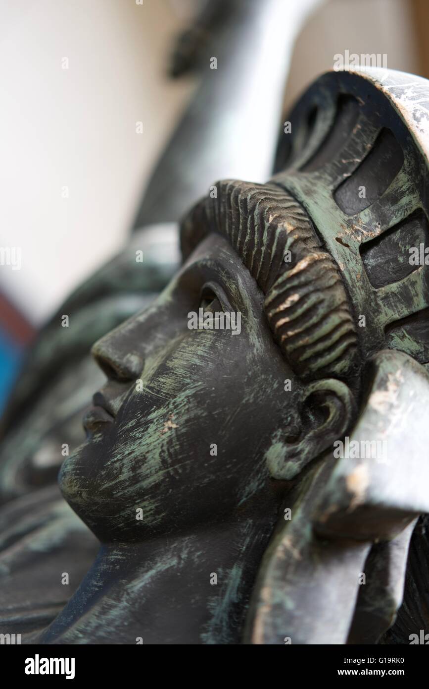 Close up photograph of a small statue of a woman Stock Photo - Alamy