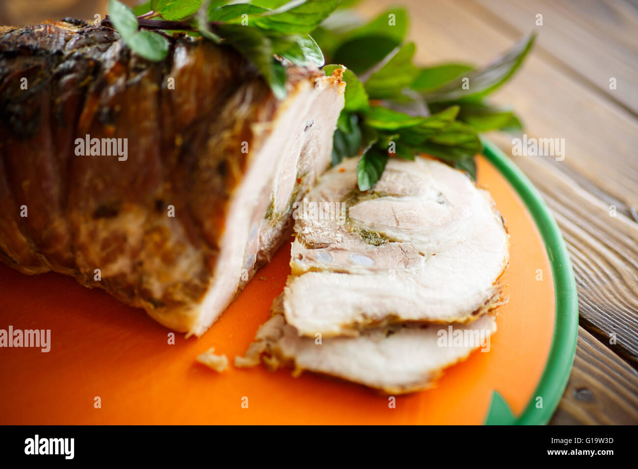 pork baked with spices and mint Stock Photo - Alamy