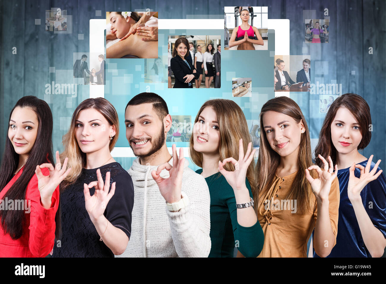 People with OK sign and tablet with collage frames on the wooden ...