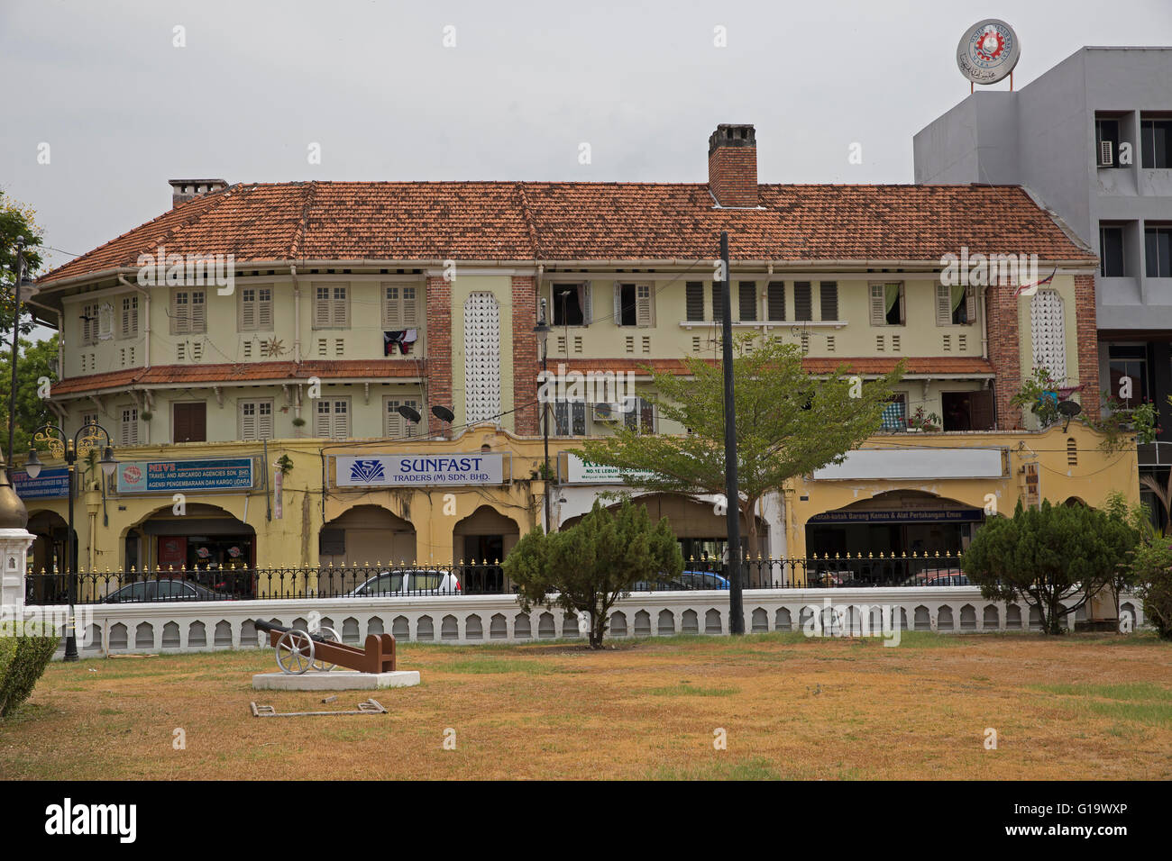 Shops under flats in Georgetown Penang Malaysia Stock Photo - Alamy