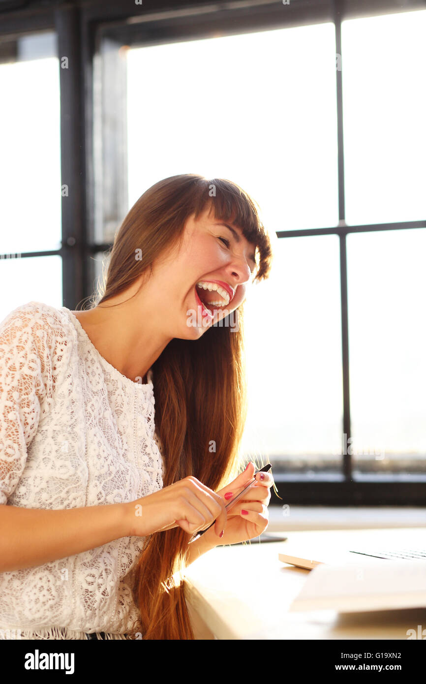 Woman laughing teeth mouth wide open hi-res stock photography and ...