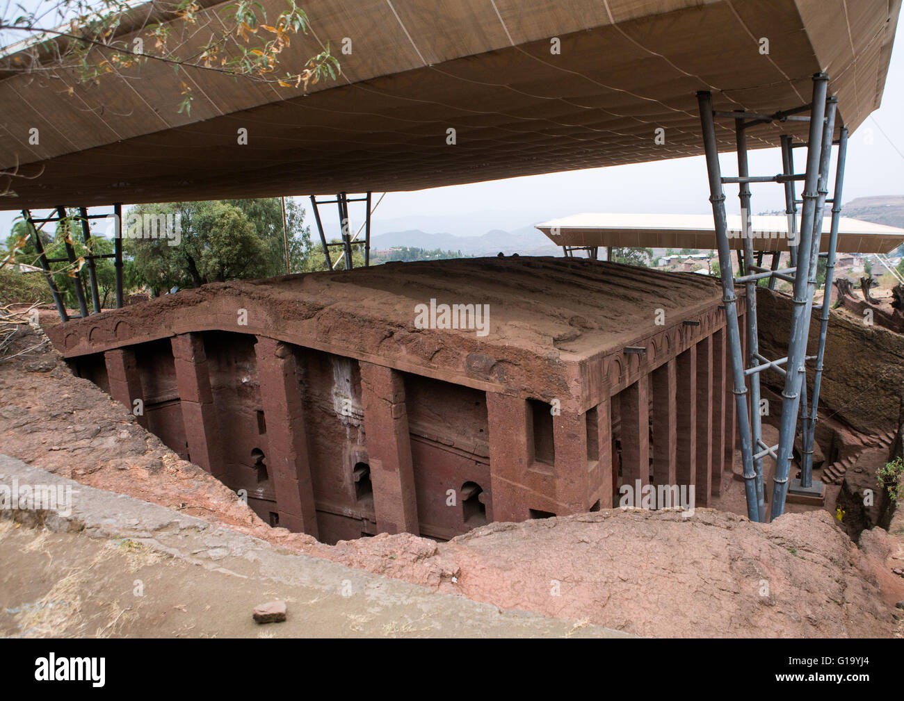 Protective shelters over a monolithic rock-cut church, Amhara region ...