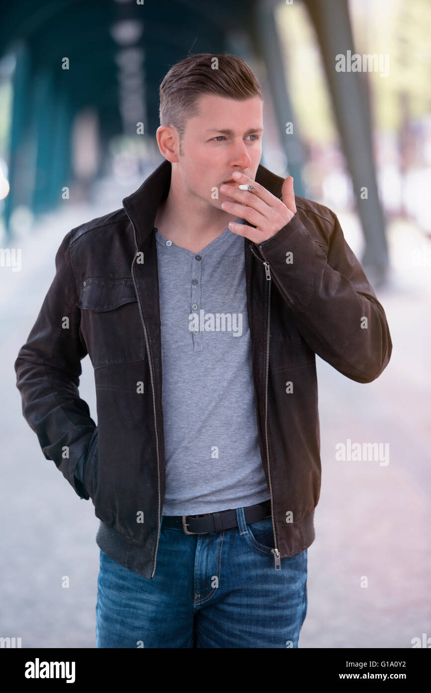 Smoking man walking street in hi-res stock photography and images - Alamy