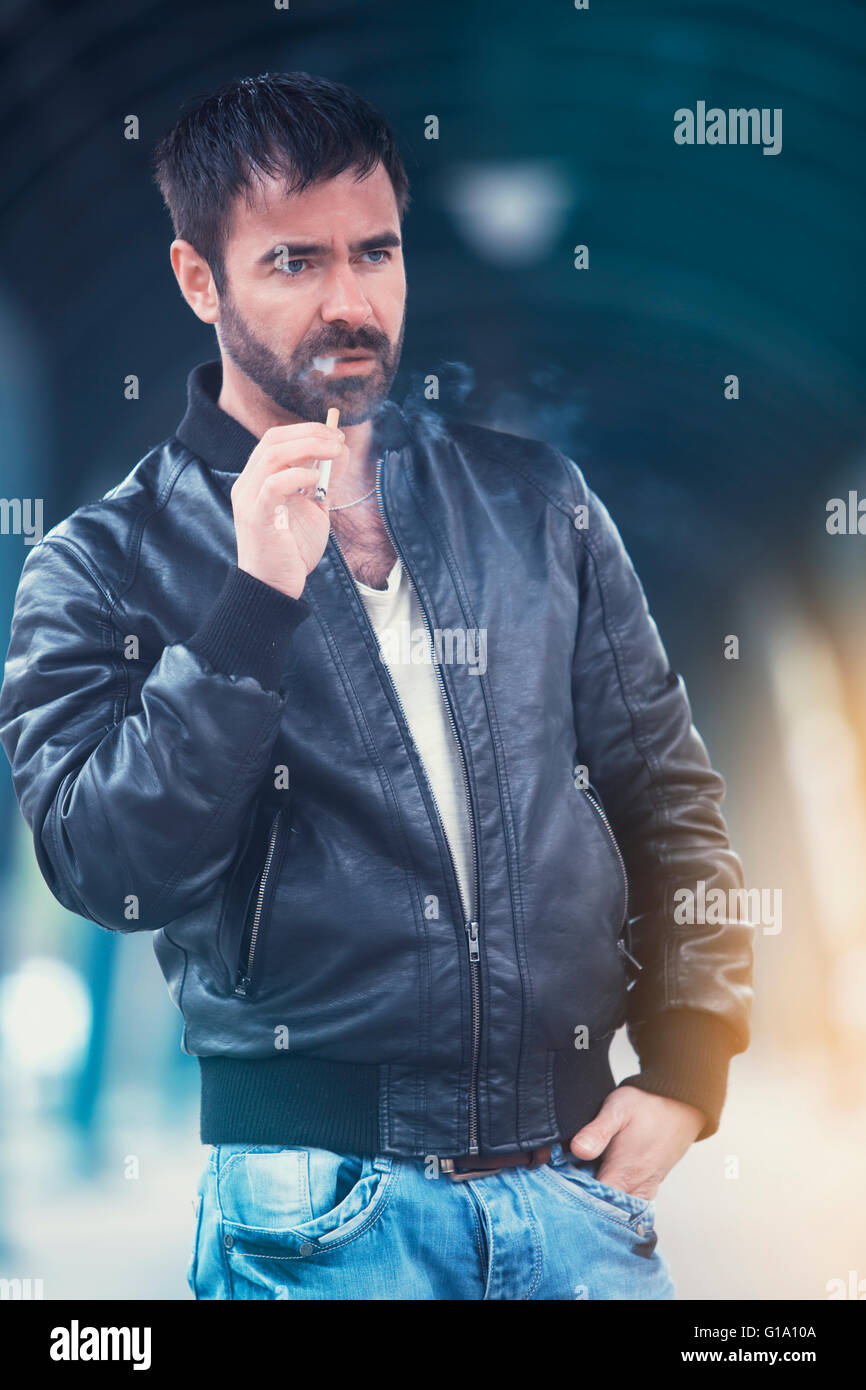 Smoking man walking street in hi-res stock photography and images - Alamy
