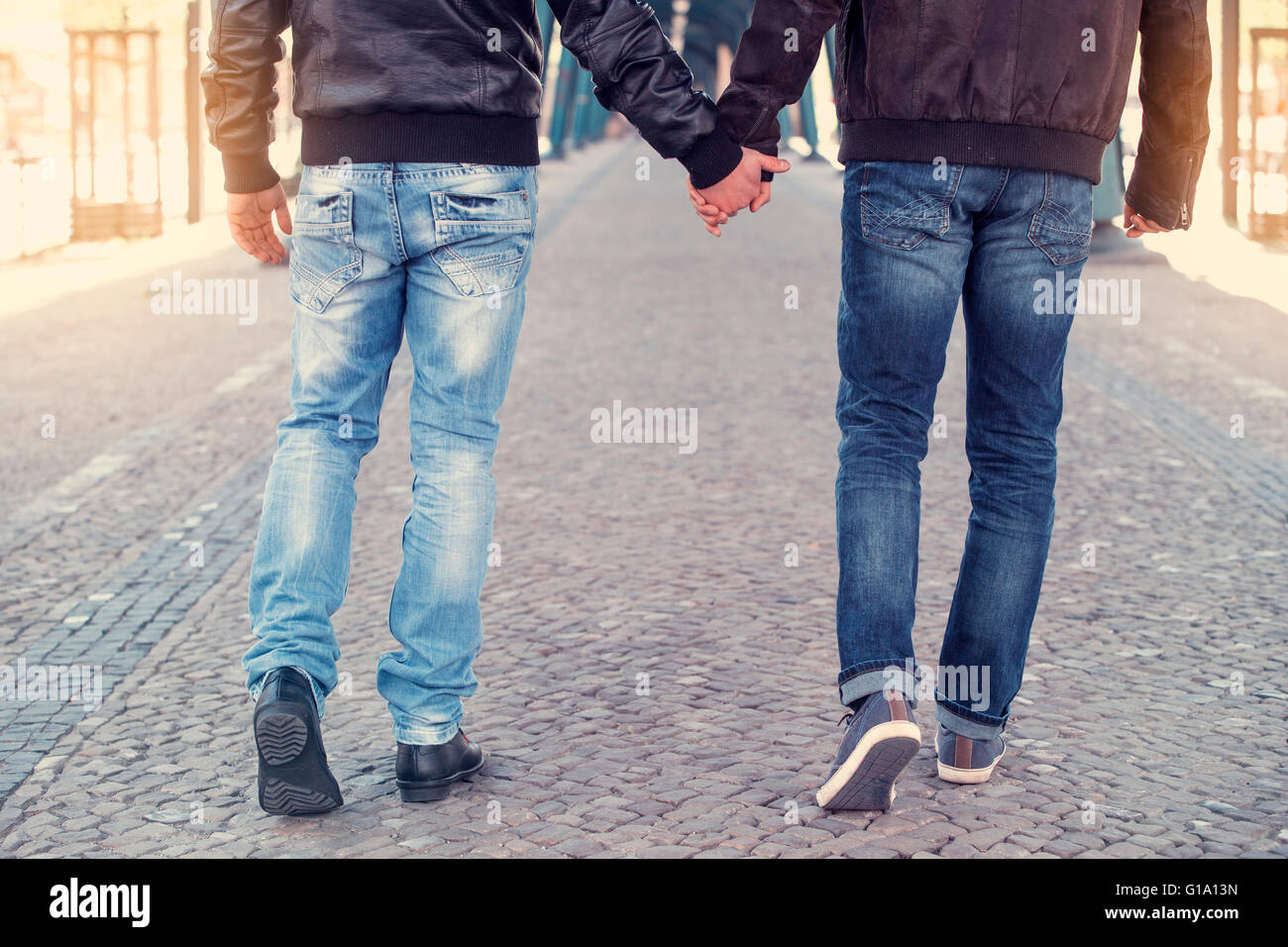 Male gay couple walking hi-res stock photography and images - Alamy