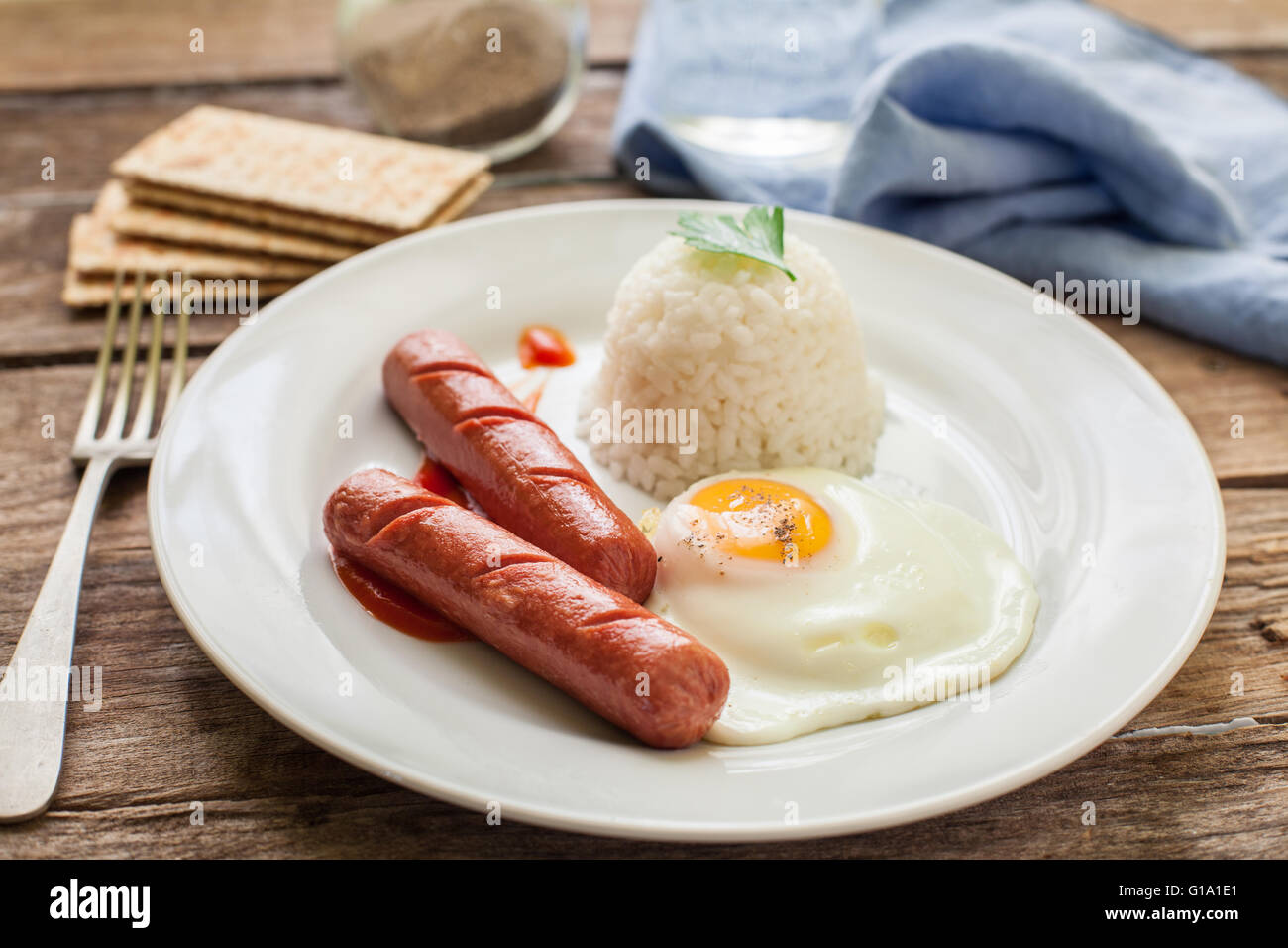 a plate with boiled rice egg and sausage Stock Photo - Alamy