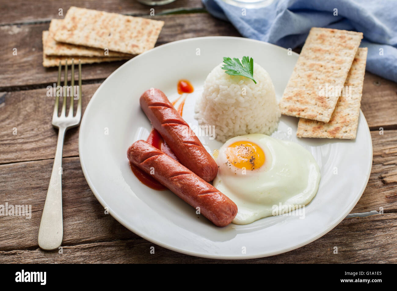 a plate with boiled rice egg and sausage Stock Photo - Alamy