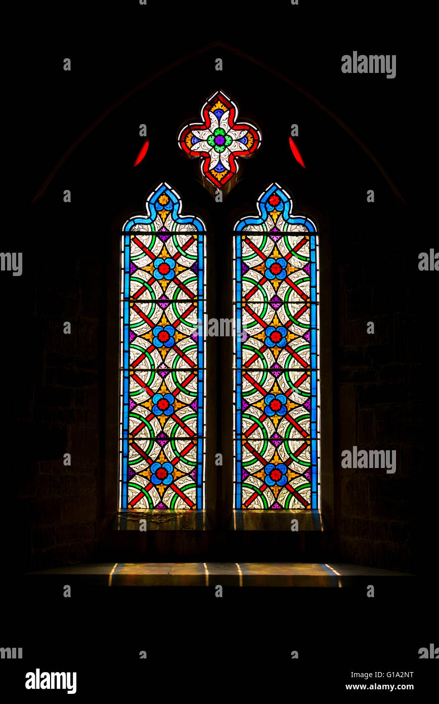 Patterned stained glass window in St Leonard & St James church, Rousham ...