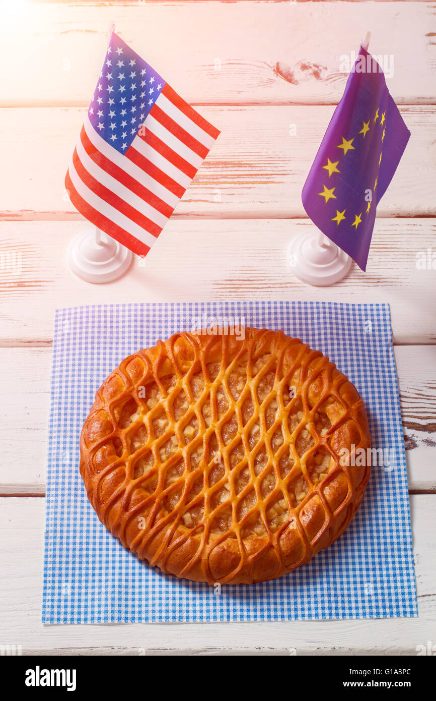 Table flags beside round pie Stock Photo - Alamy