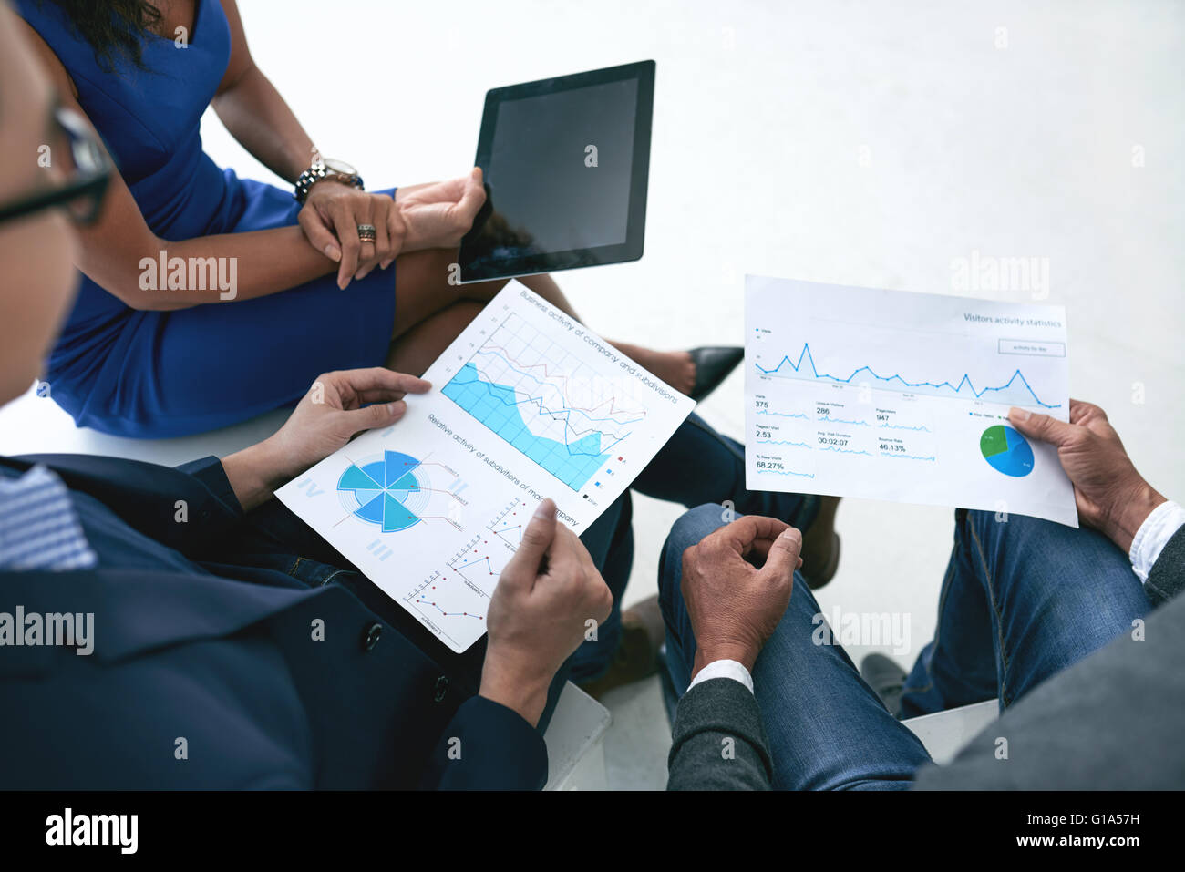 Business people analyzing financial reports hi-res stock photography ...