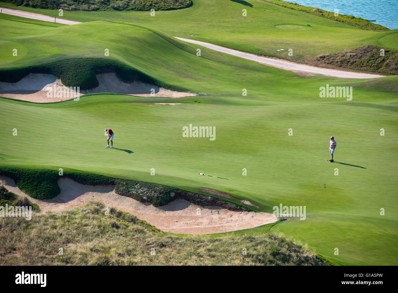 View of green golf resort field. summer vacations Stock Photo - Alamy