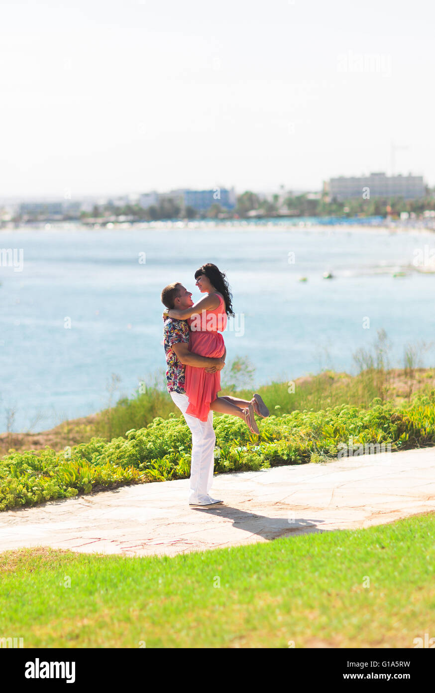 happy romantic couple in love and having fun outdoor in summer day ...