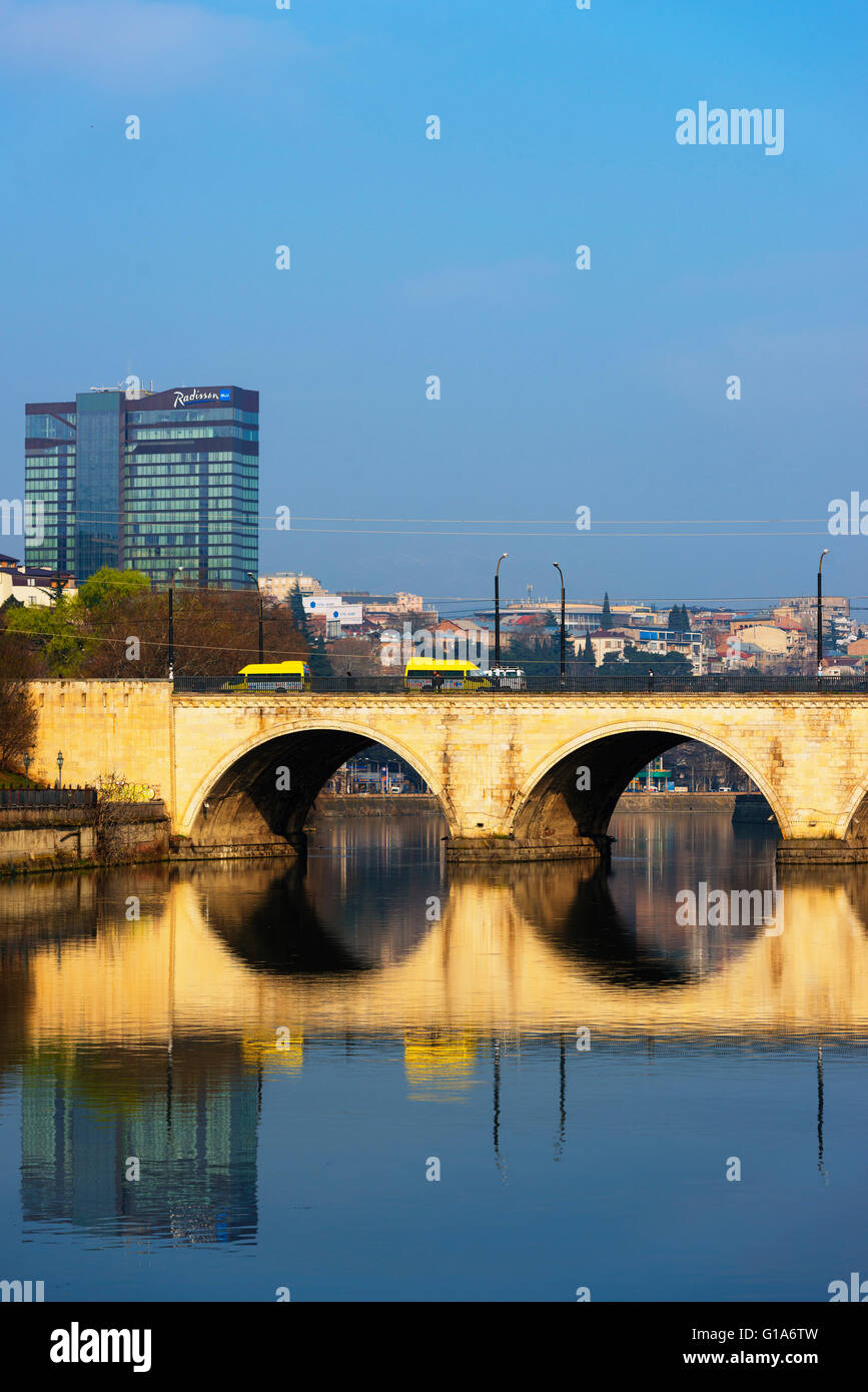 Eurasia, Caucasus region, Georgia, Tbilisi, arched bridge reflecting in ...