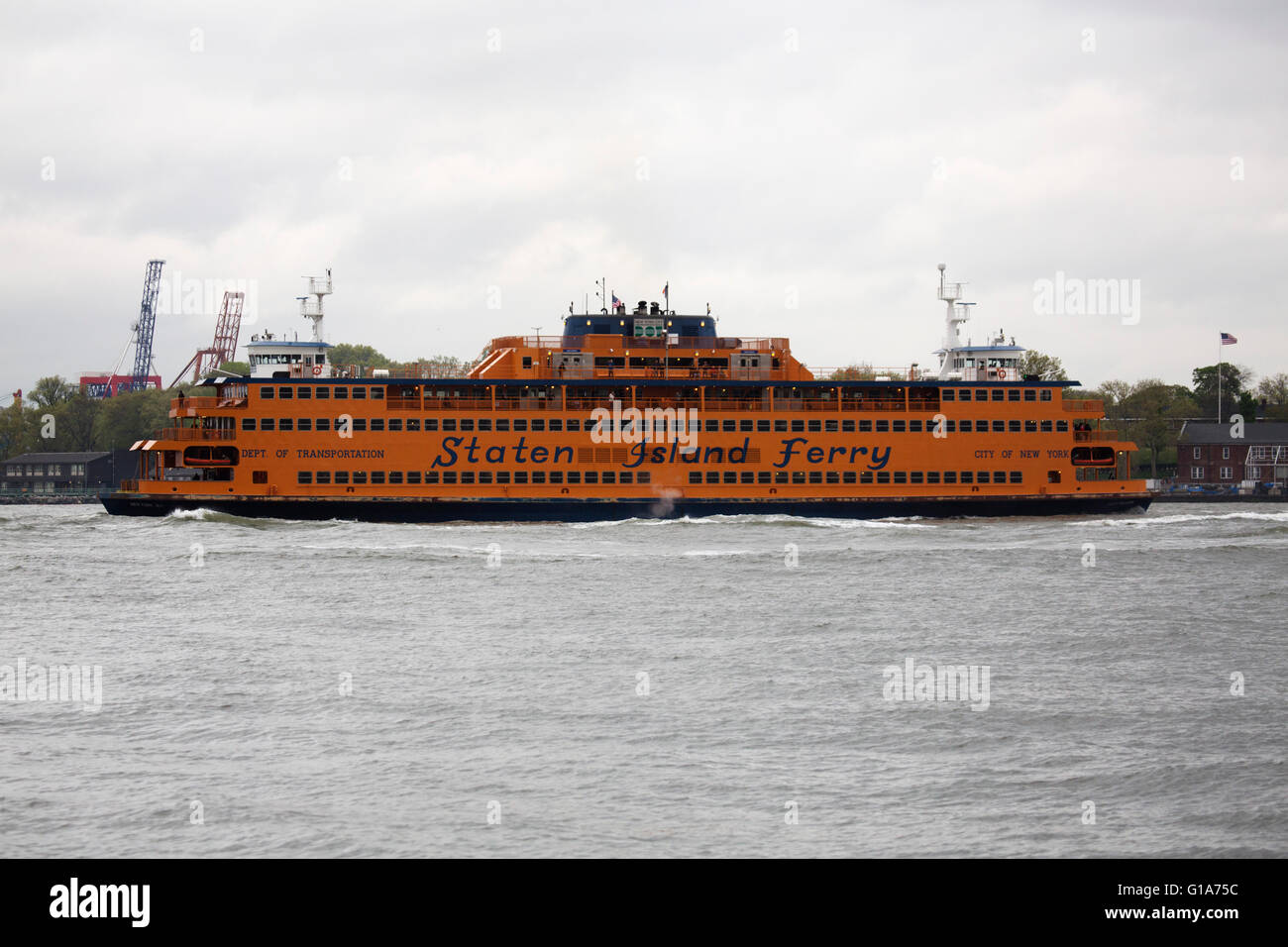 The Staten Island Ferry in the harbour of New York City, USA. The ferry ...