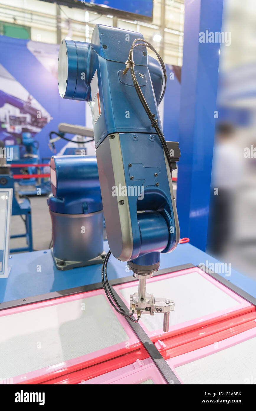robotic hand machine tool at industrial manufacture factory Stock Photo ...