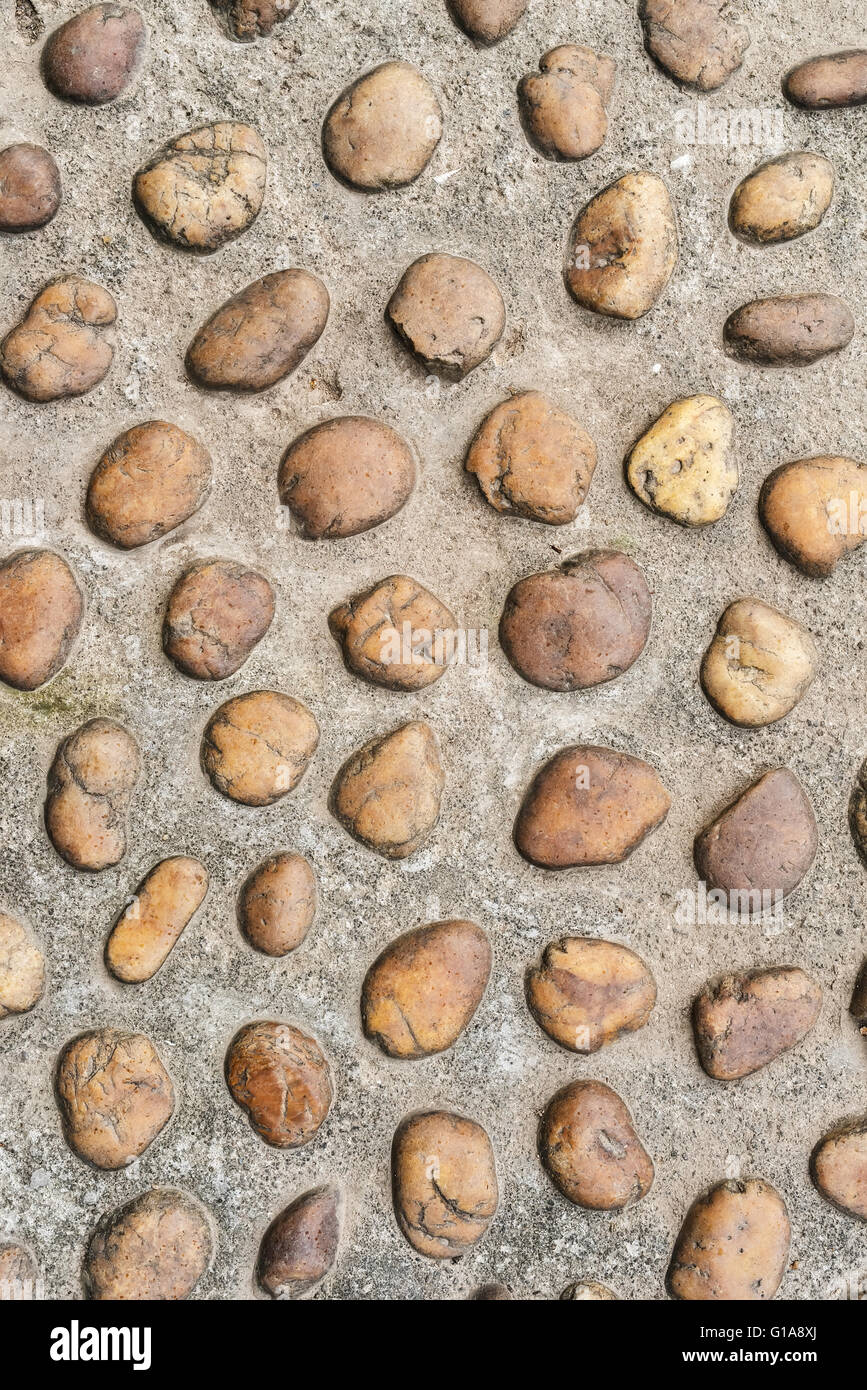 Pebbles concrete stone background hi-res stock photography and images ...