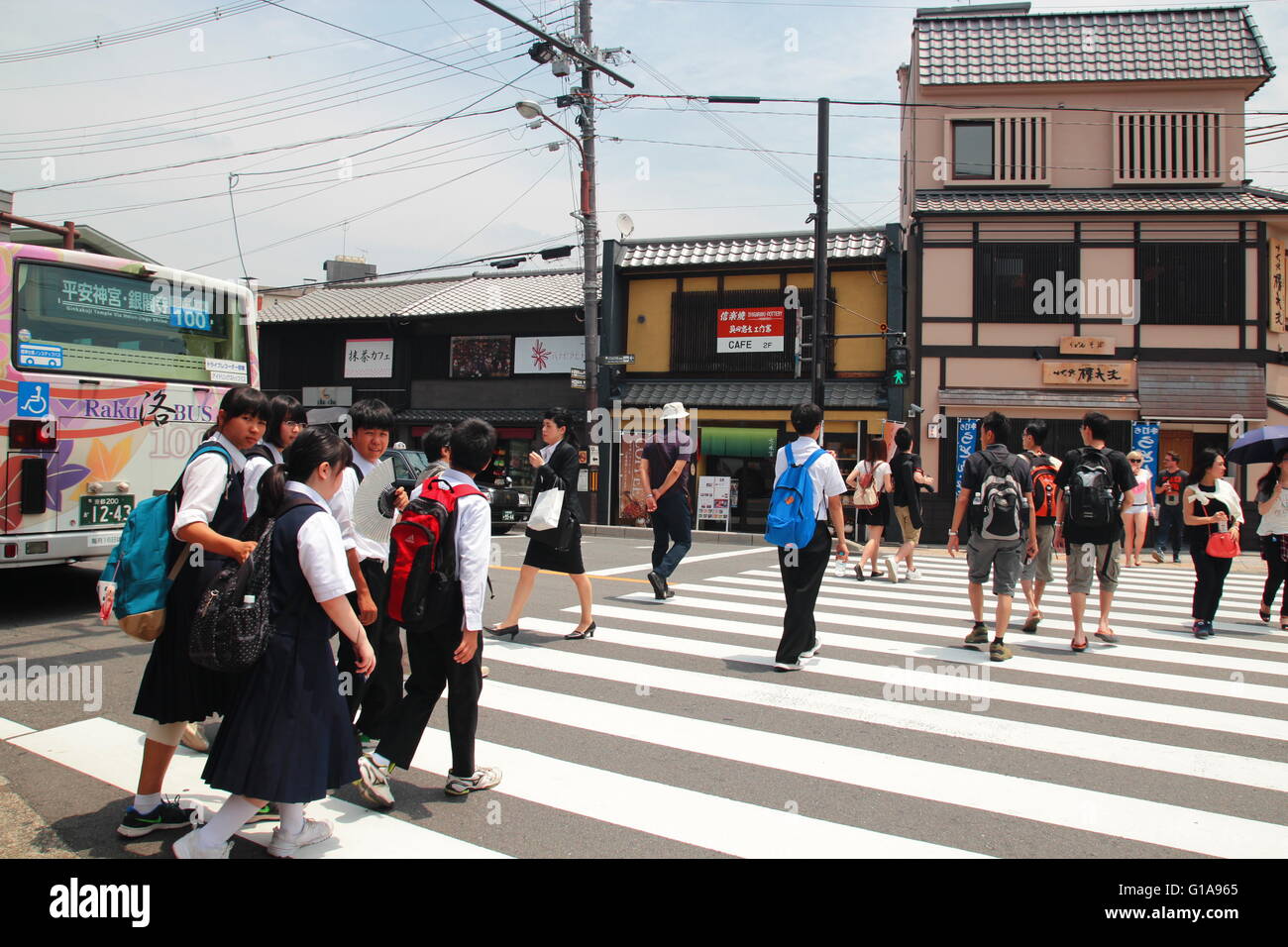 Cars waiting at zebra crossing hi-res stock photography and images - Alamy