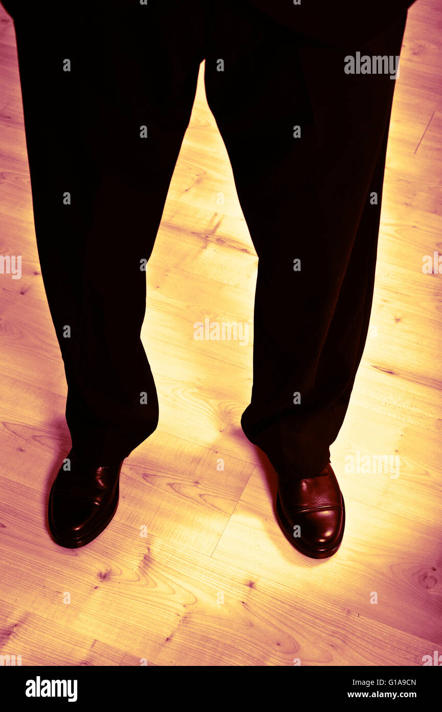 Man suit standing hi-res stock photography and images - Alamy