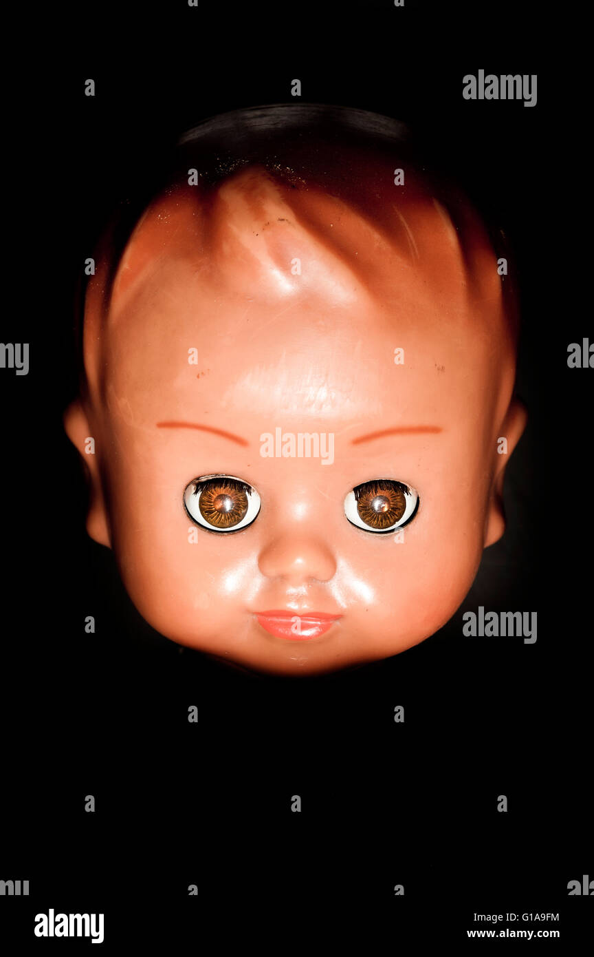 Toy doll head hi-res stock photography and images - Alamy
