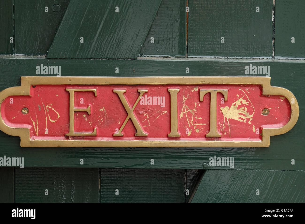 Old fashioned exit sign Stock Photo - Alamy