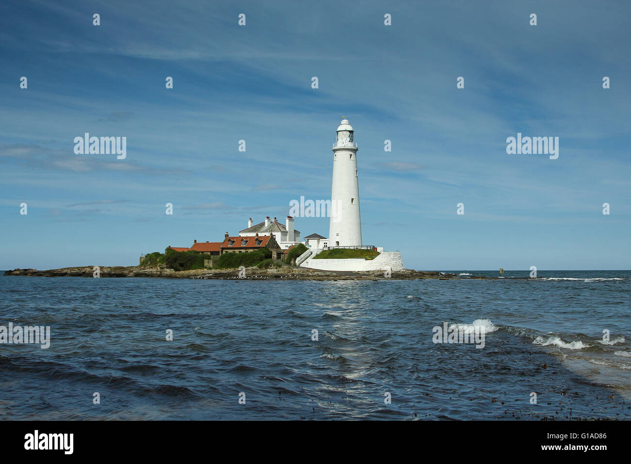 Lighthouse at the sea shore Stock Photo - Alamy