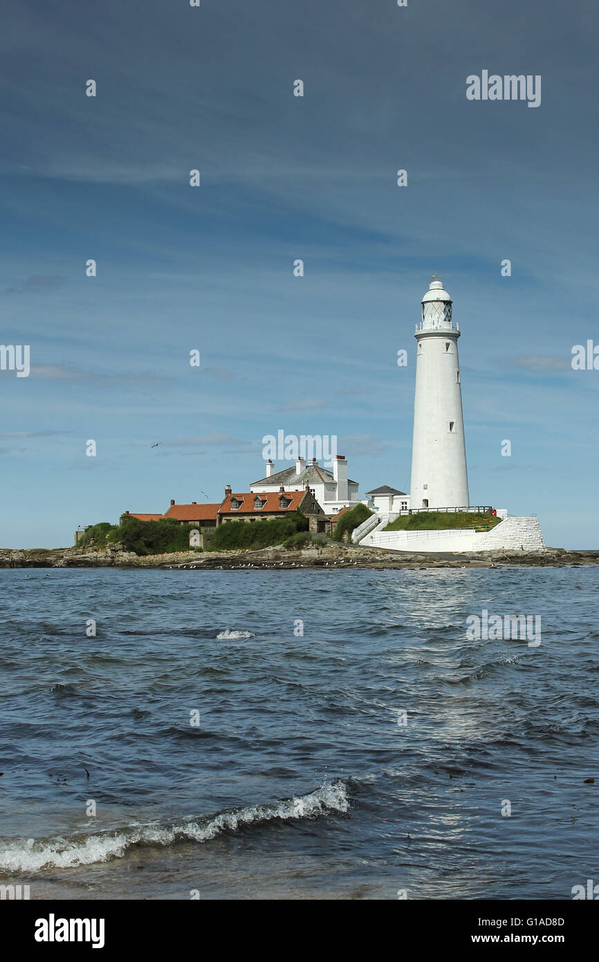 Lighthouse at the sea shore Stock Photo - Alamy
