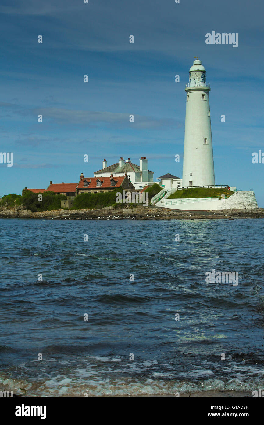 Lighthouse at the sea shore Stock Photo - Alamy
