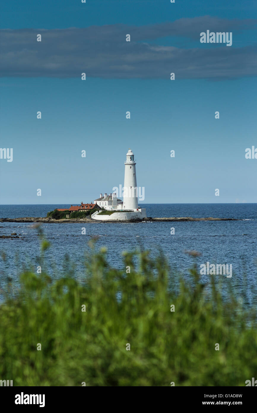 Lighthouse at the sea shore Stock Photo - Alamy