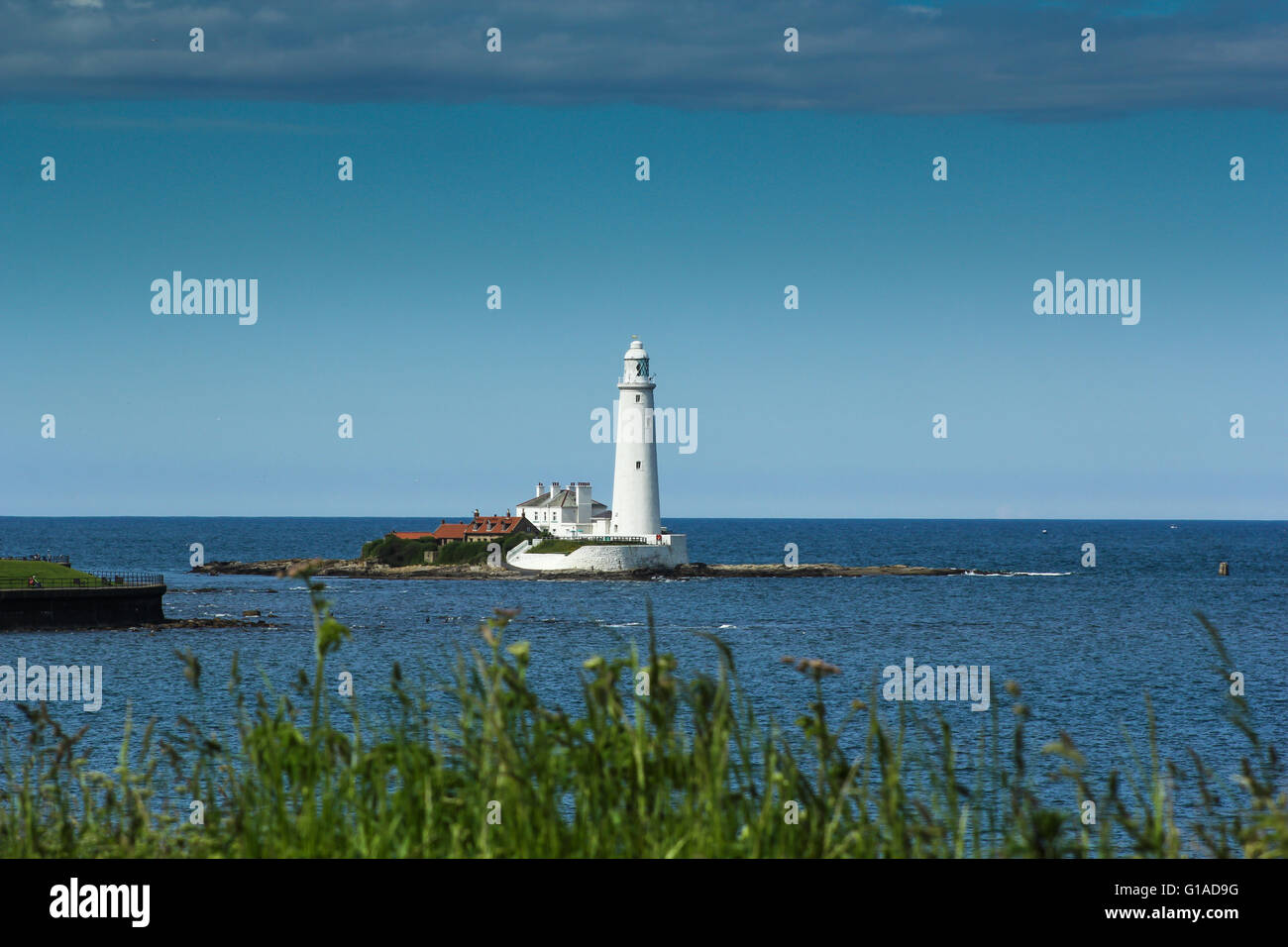 Lighthouse at the sea shore Stock Photo - Alamy