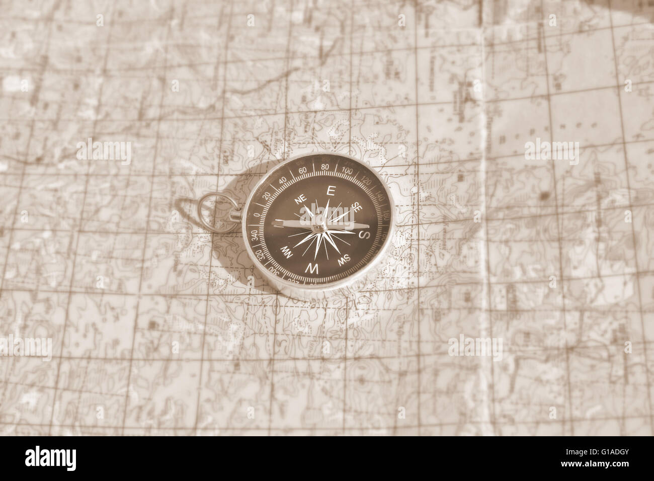 Tools for the journey - a map and a compass. Magnetic compass is ...