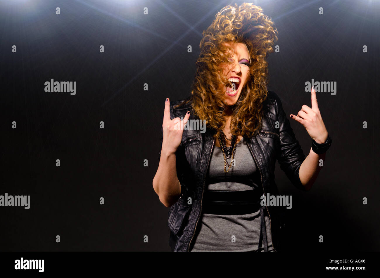 dancing to the rock music Stock Photo - Alamy