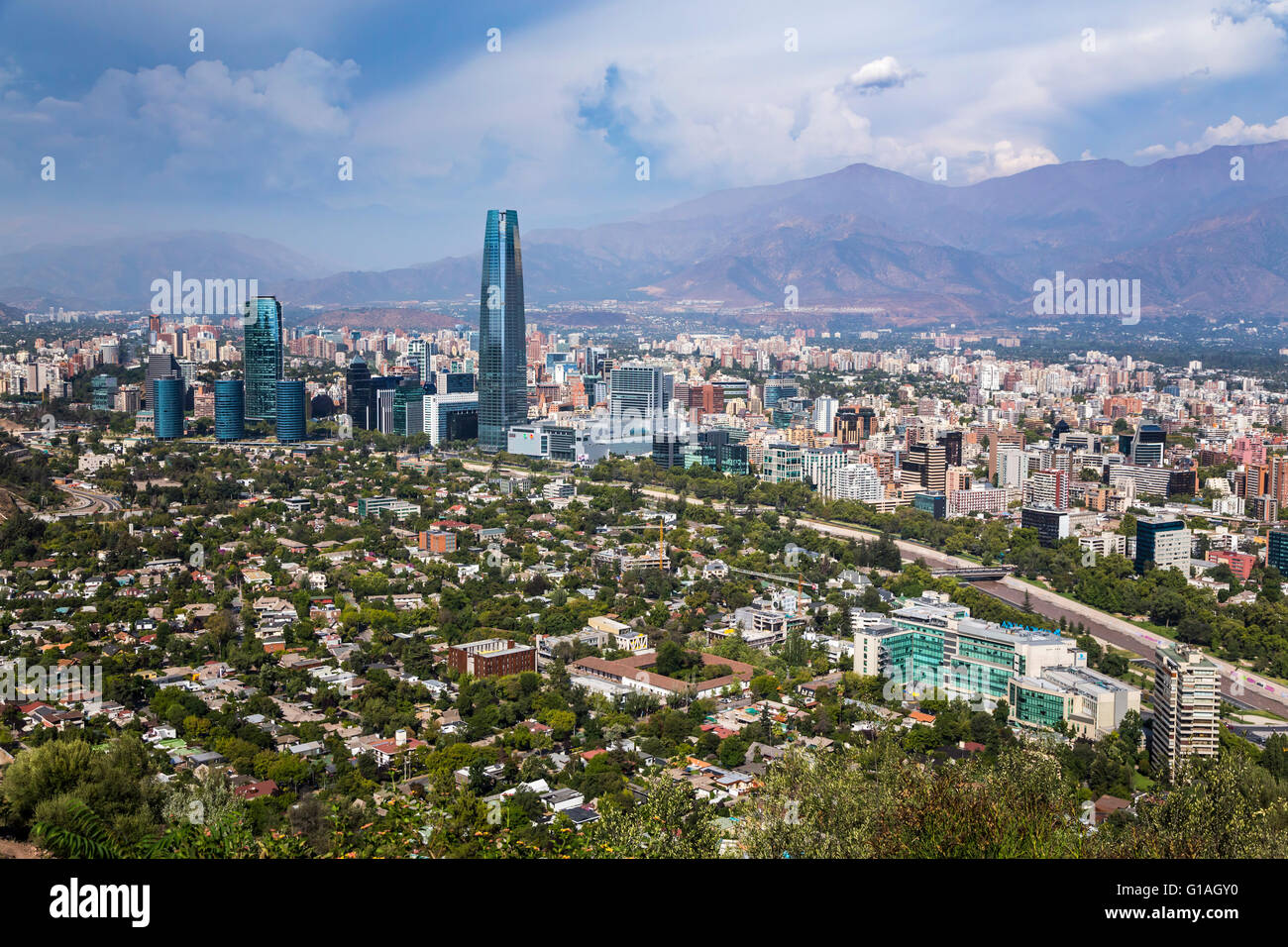 The city skyline and clouds over the Andes Mountains in Santiago, Chile ...
