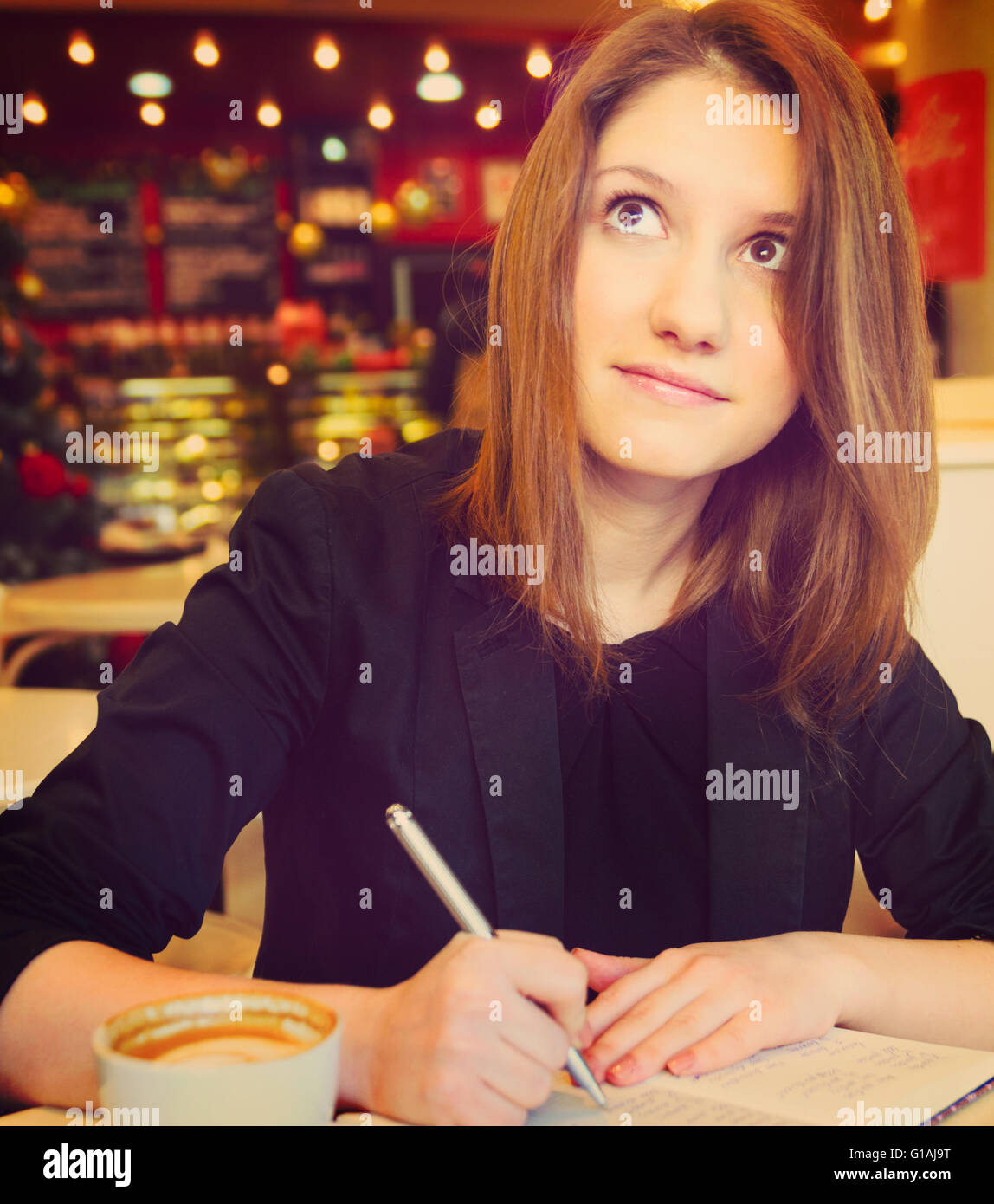 young woman with notebook Stock Photo - Alamy