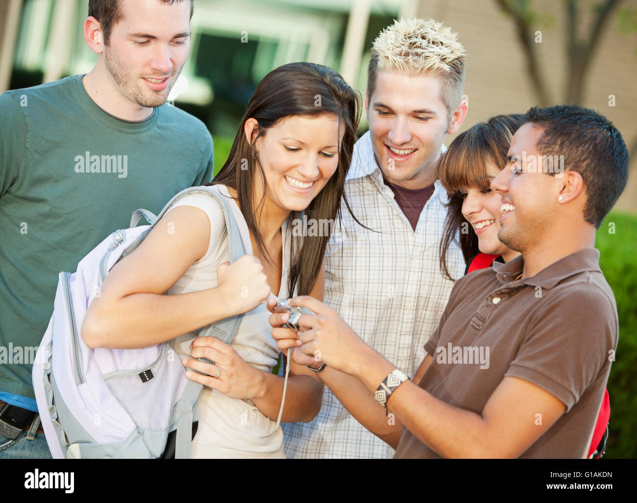 A multi-ethnic group of college students hanging around campus Stock ...