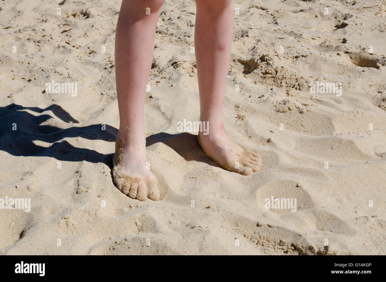 Kid sand covered feet hi-res stock photography and images - Alamy