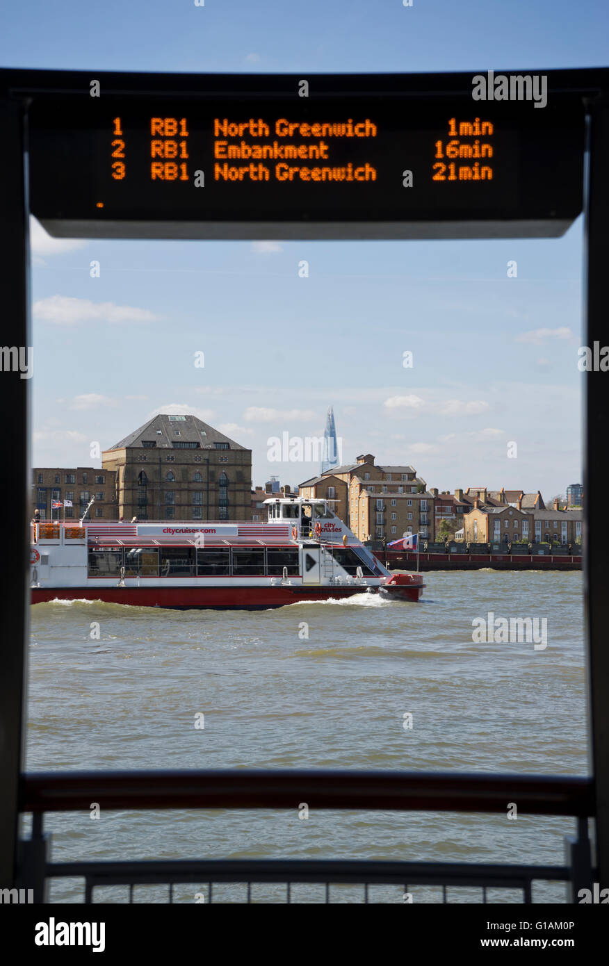 River Thames passenger ferry services by Canary Wharf. London, UK Stock ...