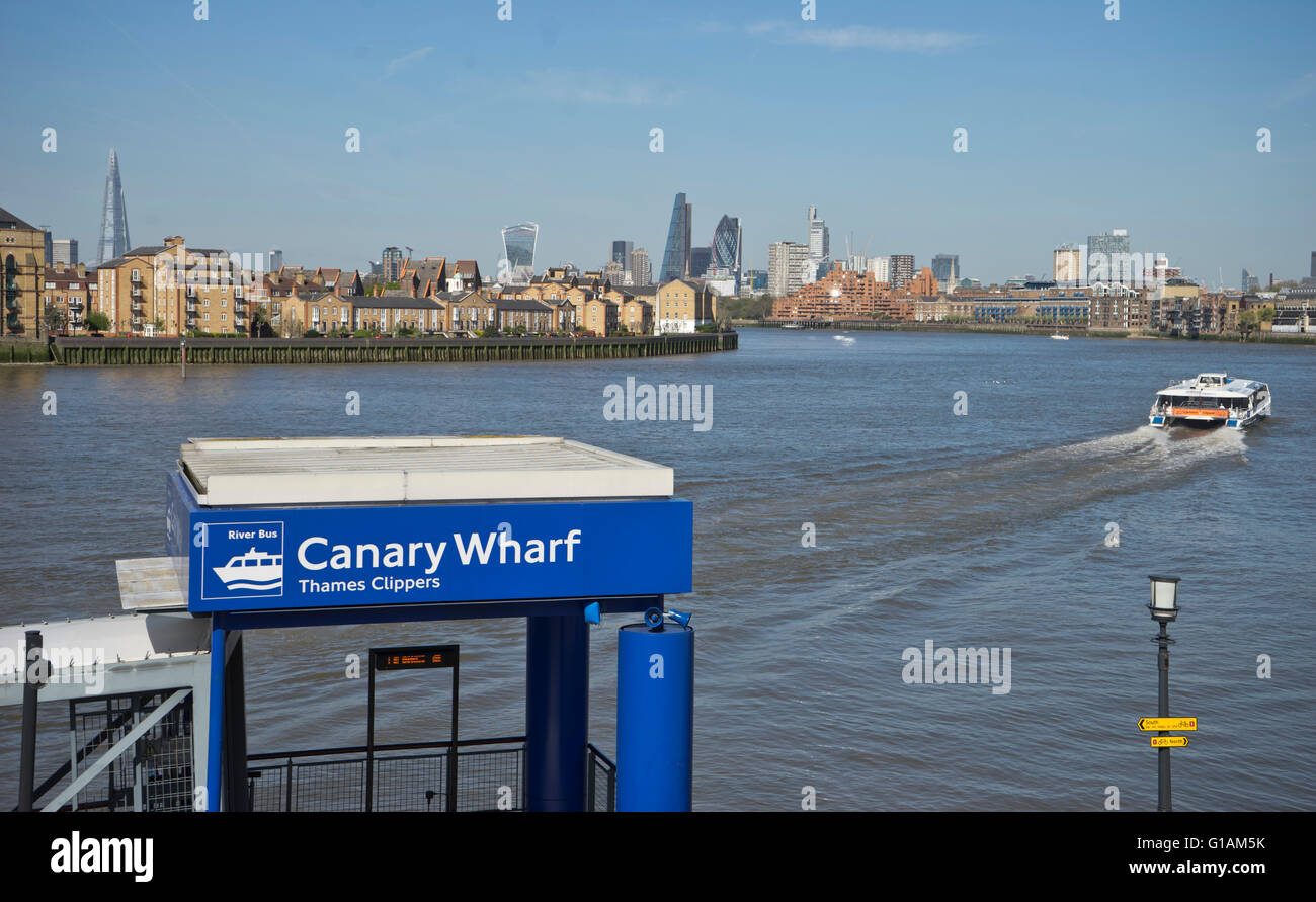 River Thames passenger ferry services by Canary Wharf. London, UK Stock ...