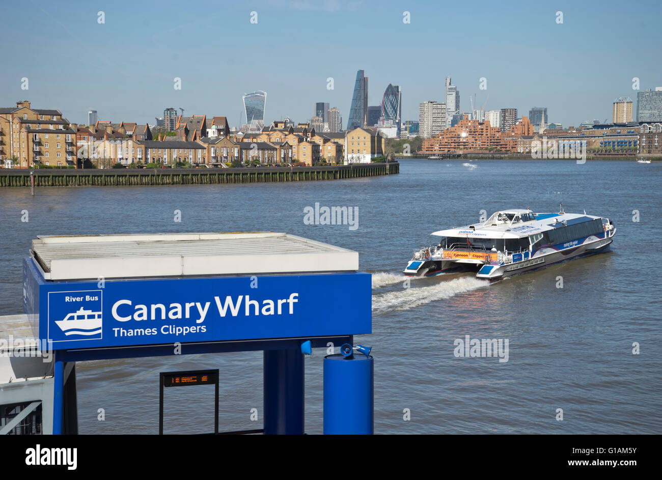 River Thames passenger ferry services by Canary Wharf. London, UK Stock ...